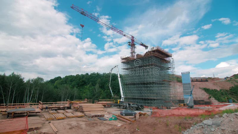 Building Site with Construction Tower Crane and Materials Stock Video ...