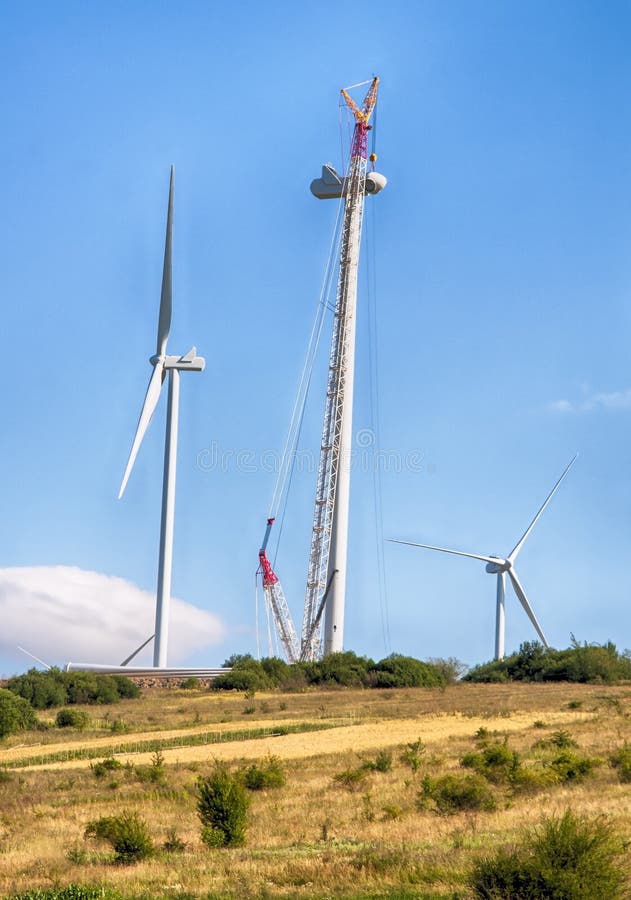 Building wind turbines stock photo. Image of generator - 100519600
