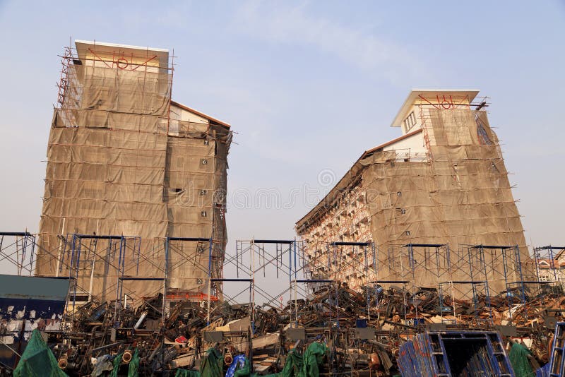Building with Slant Glass Roof Over Stairs Leading To Glass Door of ...