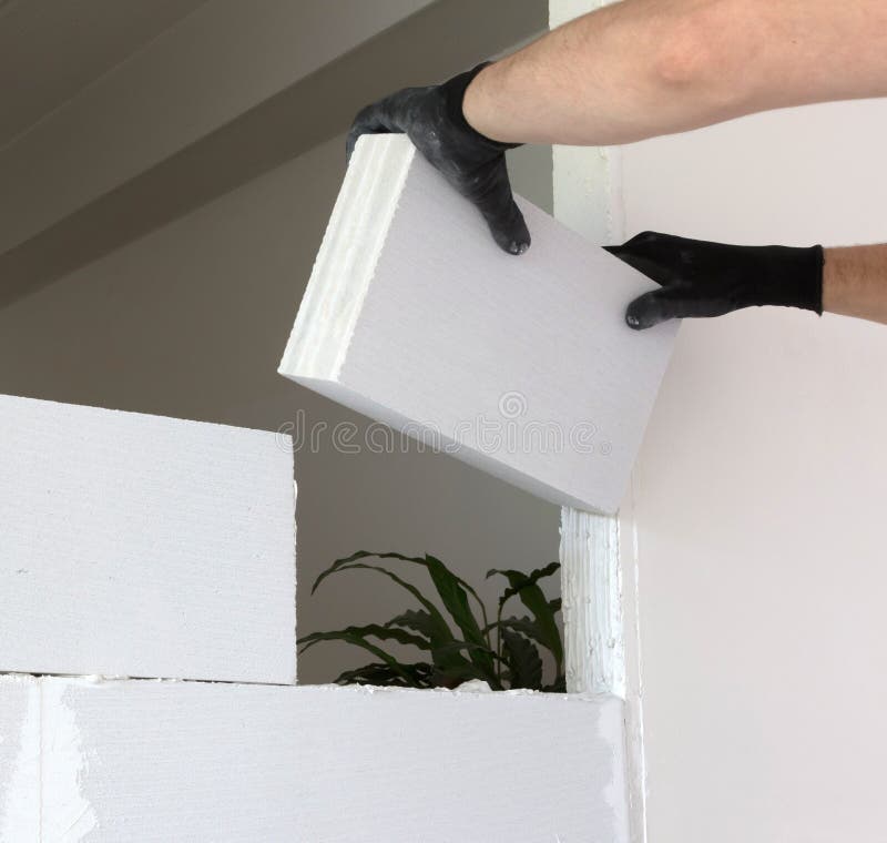 Building a Small Wall with Lightweight Concrete Blocks Stock Image ...