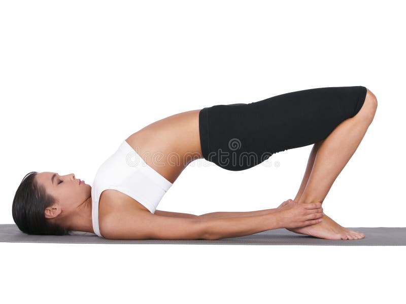 Building a Strong Back and Core. a Young Woman Doing Stretches while ...