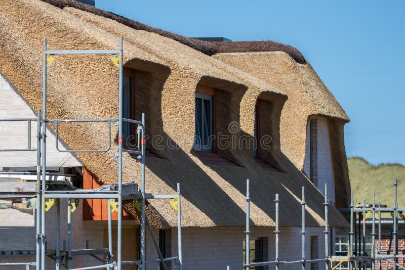Building a Thatched Roof House Stock Image - Image of thatch, home ...