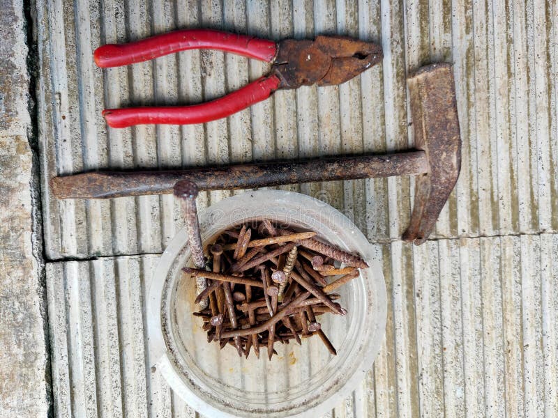 A Building Tool in the Form of Nails, Hammer, and Pliers Stock Image ...