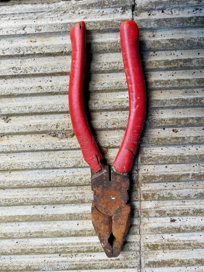 A Building Tool in the Form of Red Pliers Stock Photo - Image of food ...