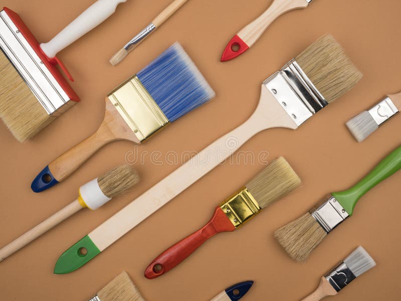 Building Tool. Paint Brushes. Beige Background. the Concept of Repair ...