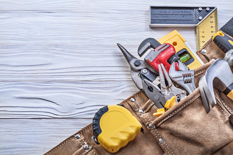 Building Tooling in Tool Belt on Wooden Board Construction Conce Stock ...