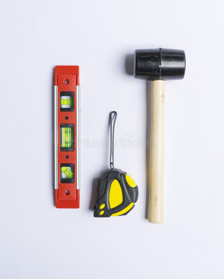 Building Tools, Rubber Hammer, Meter and Bubble Level on White ...
