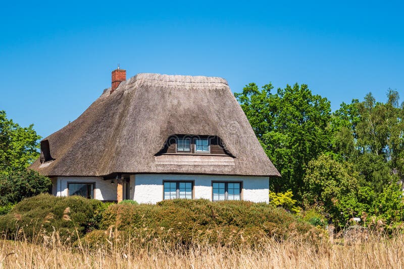 Building, Trees and Blue Sky in Wieck, Germany Stock Image - Image of ...