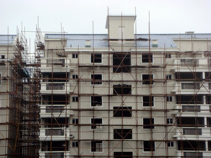 Building Under Construction Stock Photo - Image of housing, scaffold ...