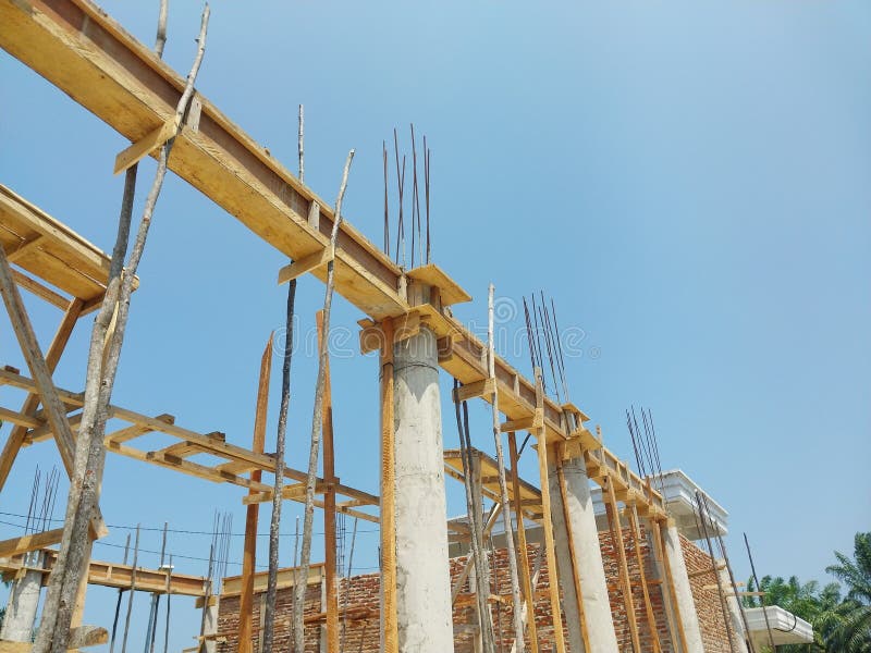 Building Under Construction. a Building Column Whose Formwork Has Just ...