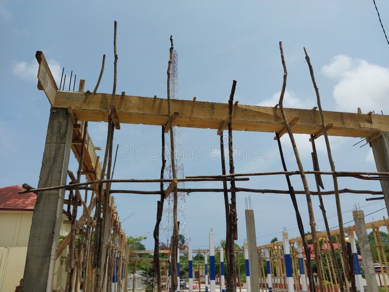 Building Under Construction. a Building Column Whose Formwork Has Just ...