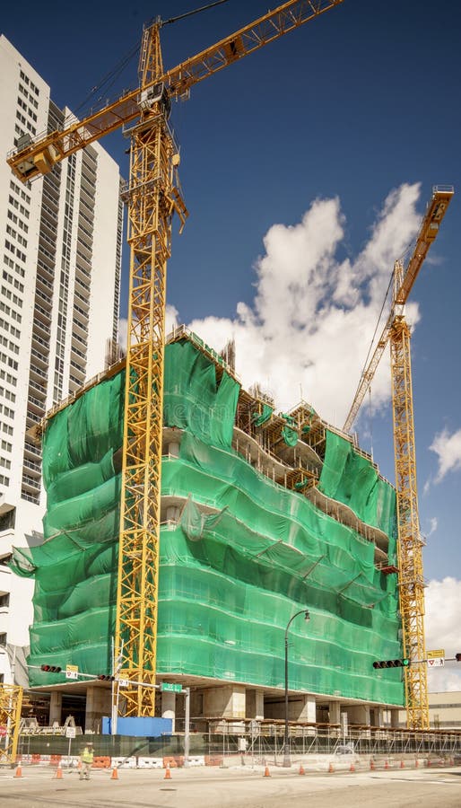 Building Under Construction Covered with Green Safety Debris Tarp ...