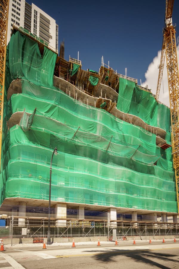 Building Under Construction Covered with Green Safety Debris Tarp ...