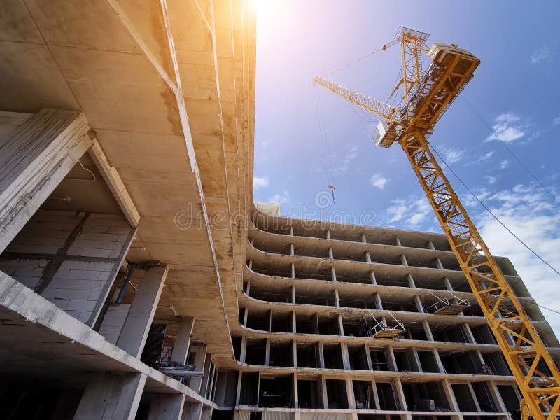Building Under Construction with a Crane in the Foreground Stock Photo ...