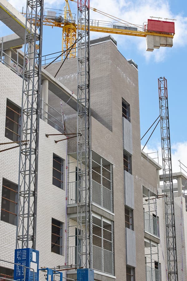 Building Under Construction. Crane Machinery Structure Stock Image ...