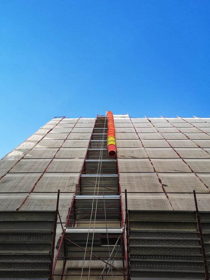 Building Under Construction and Rubble Conveyor Stock Image - Image of ...