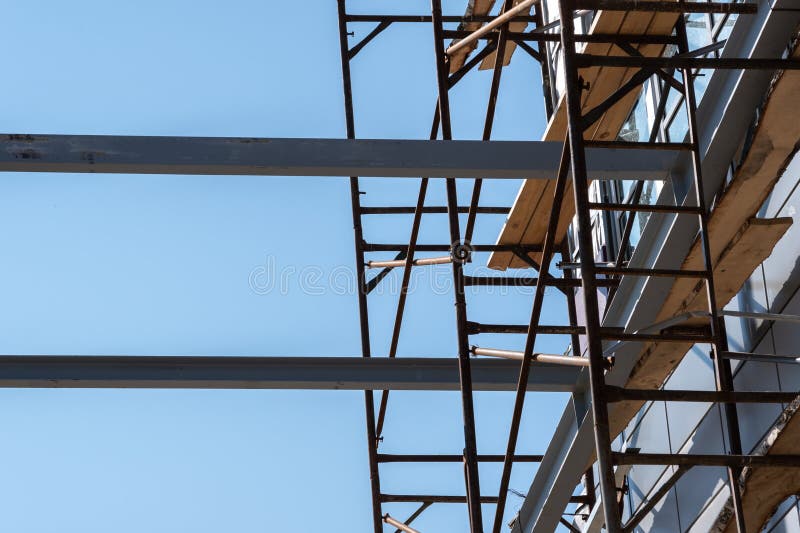 Building Under Construction with Scaffolds. the Process of Renovating a ...