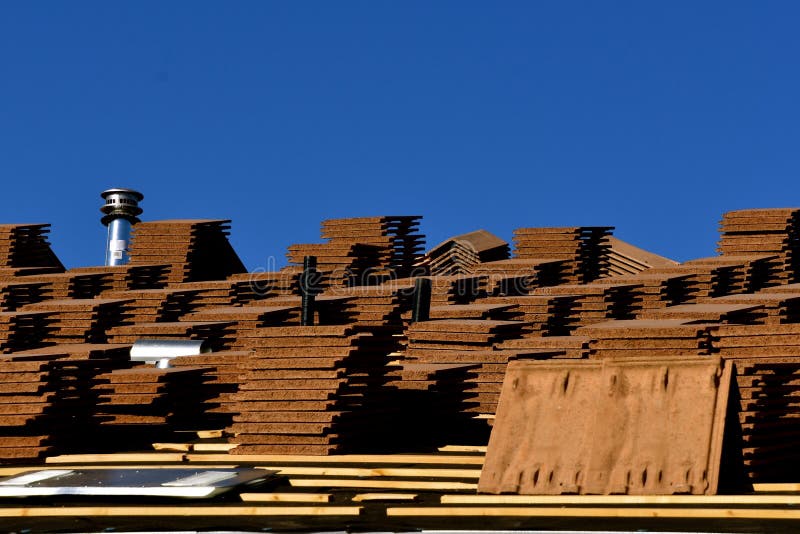 Tile Shingles Stacked and Ready for Roofing Stock Photo - Image of ...