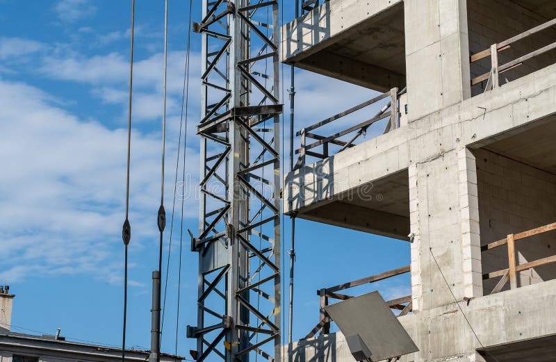 Building Under Construction. Tower Cranes Constructing a New Building ...