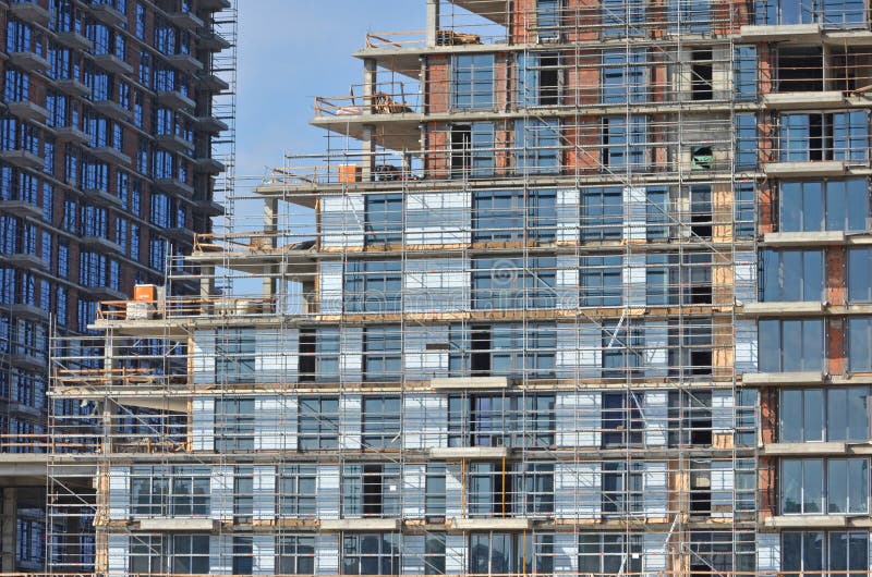 Building Under Construction Stock Photo - Image of process, equipment ...