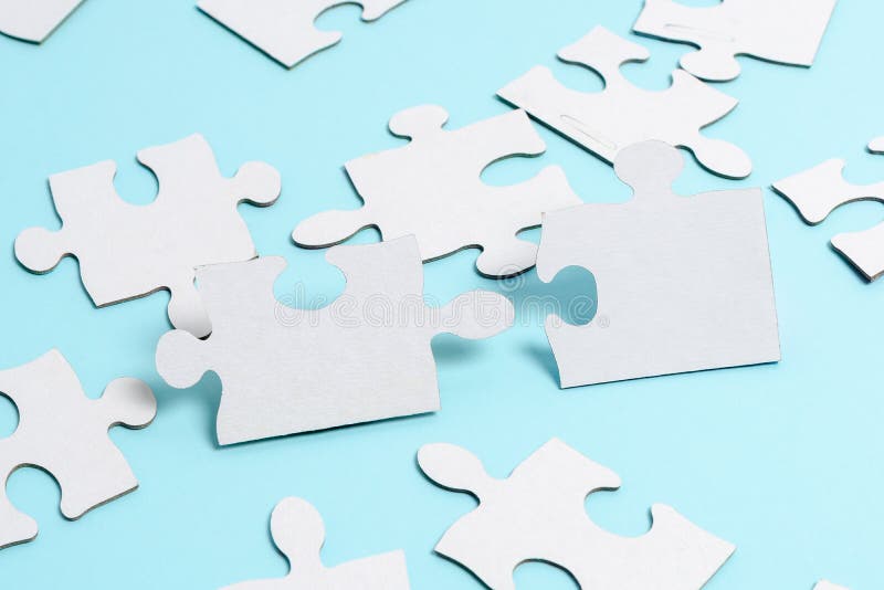 Close-Up White Jigsaw Pattern Puzzle Pieces To Be Connected with ...