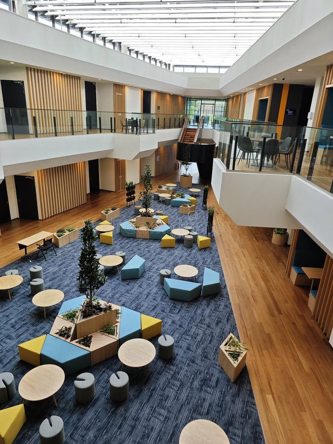 A Building with Various Seating Options in it S Main Lobby Stock Image ...