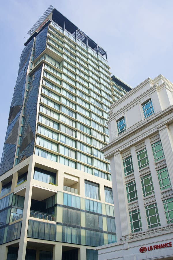 The Building is Very Tall and is Very Bright with Many Windows ...