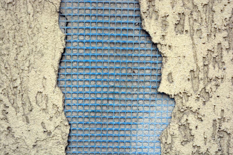 The Building Wall Cladding is Made of Brown Textured, Structural ...