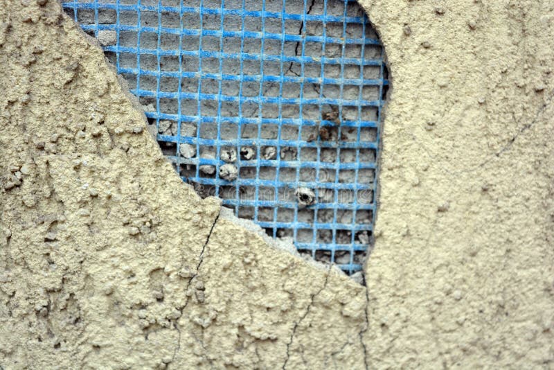 The Building Wall Cladding is Made of Brown Textured, Structural ...