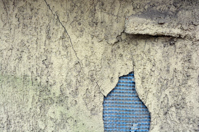 The Building Wall Cladding is Made of Brown Textured, Structural ...