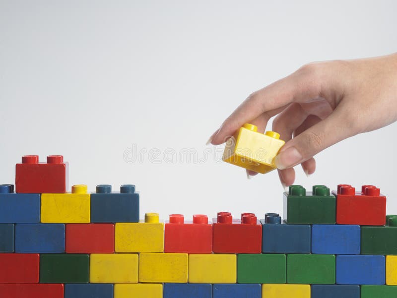 Hand Stack Up Lego Set As Wall White Stock Photos - Free & Royalty-Free ...