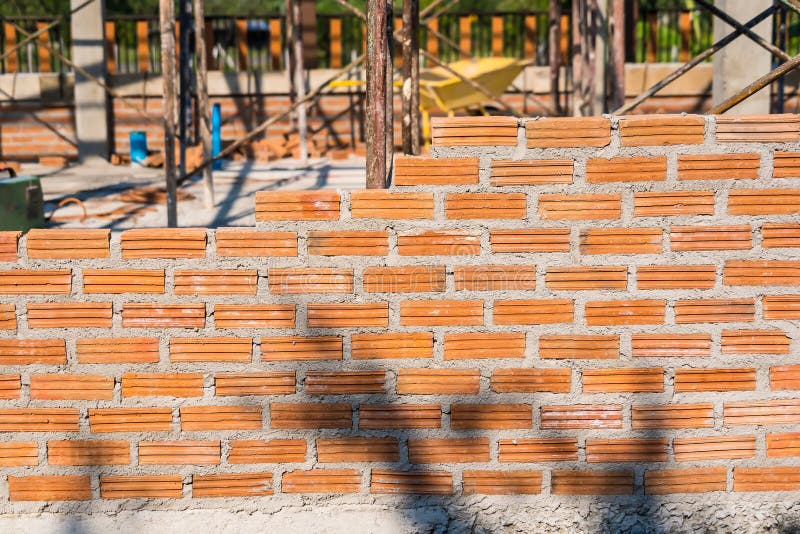 Building Wall by Mason on Constrcution Site Stock Photo - Image of ...