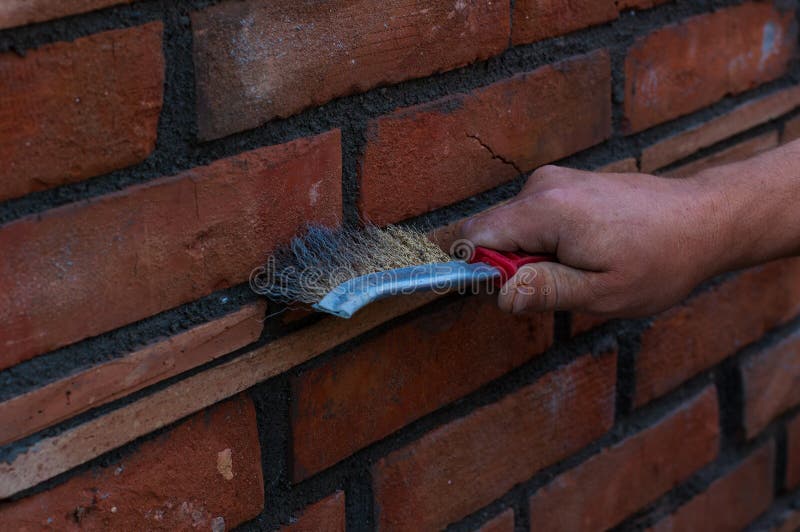 Building a Wall with Red Brick. Working with Bricks for Building a Wall ...