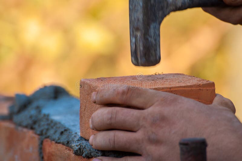 Building a Wall with Red Brick. Working with Bricks for Building a Wall ...
