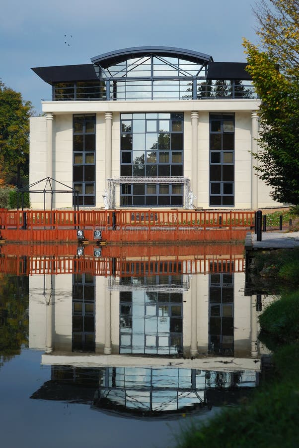 A building and water stock photo. Image of reflection - 21733330