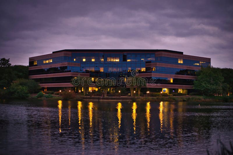 Building on the Water at Dusk. Light Reflections Off Water Stock Photo ...