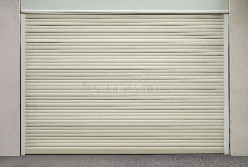 Building with White Roller Shutter Garage Door Stock Photo - Image of ...