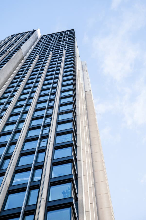 Building with Windows, View from Below, Clouds in the Sky Stock Image ...