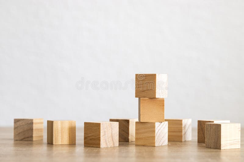 Building a Wooden Cube Tower on a Table Stock Photo - Image of ...