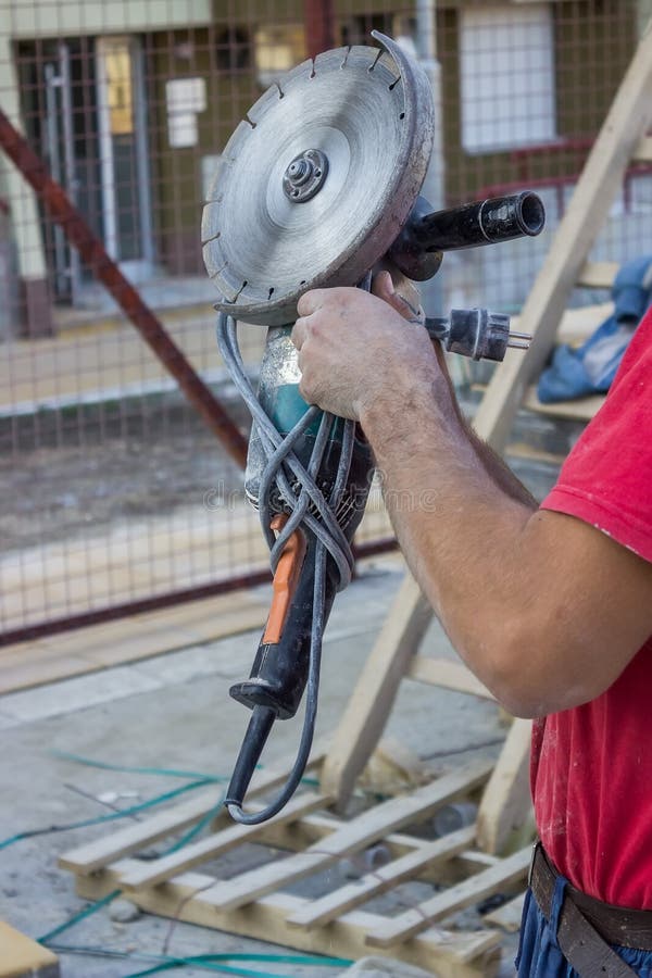 Building Worker with Angle Grinder Stock Photo - Image of grinding ...