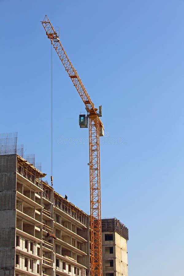 Buildings Construction Process with Big Crane. Stock Photo - Image of ...