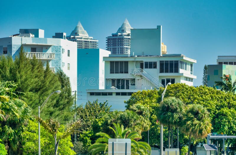 Buildings of Miami Beach among the Palm Trees Stock Image - Image of ...