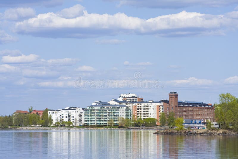 Buildings near lake shore stock photo. Image of hotel - 9544014
