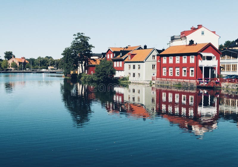 Buildings Next To River in City Stock Image - Image of river, town ...