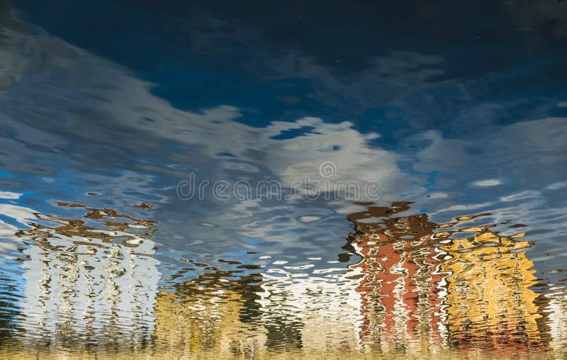 Buildings Reflected in Water Stock Image - Image of street ...