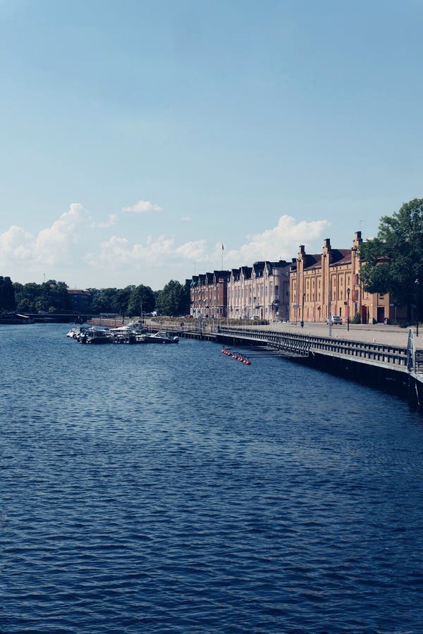 Buildings by River during Summer Stock Photo - Image of water, harbor ...