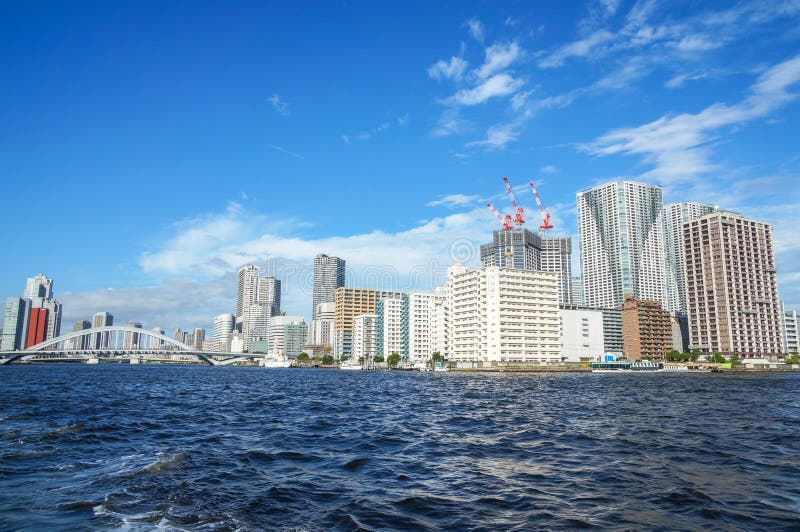 Buildings at Sumida River, Tokyo, Japan Stock Image - Image of clouds ...