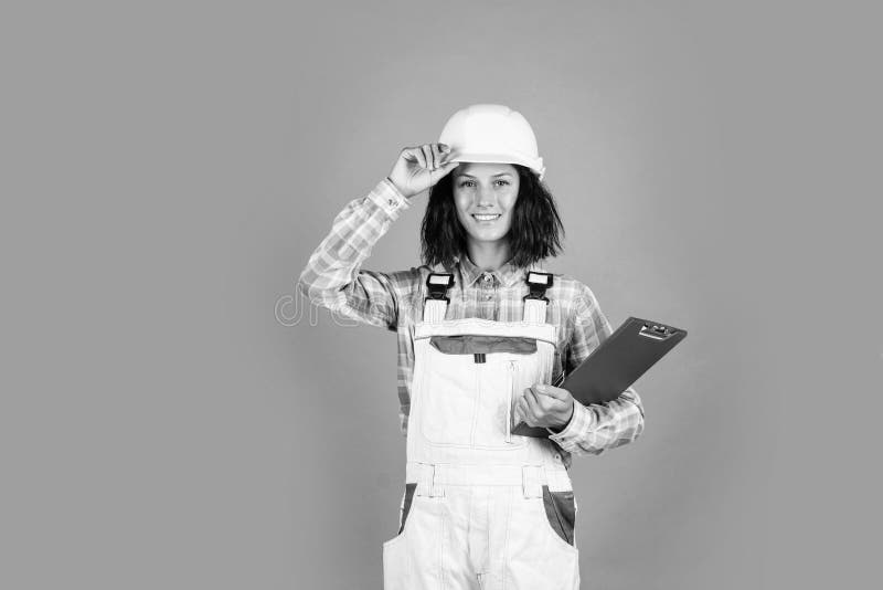 Built with Excellence. Carpenter Assistant Wear Protective Helmet. Girl ...