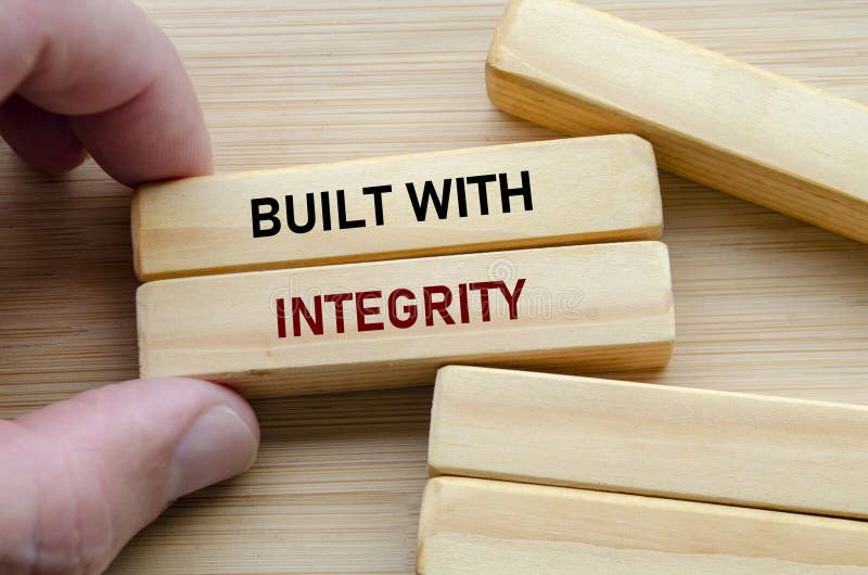 Built with Integrity Text on Wooden Blocks Held by Hand Reflects Trust ...