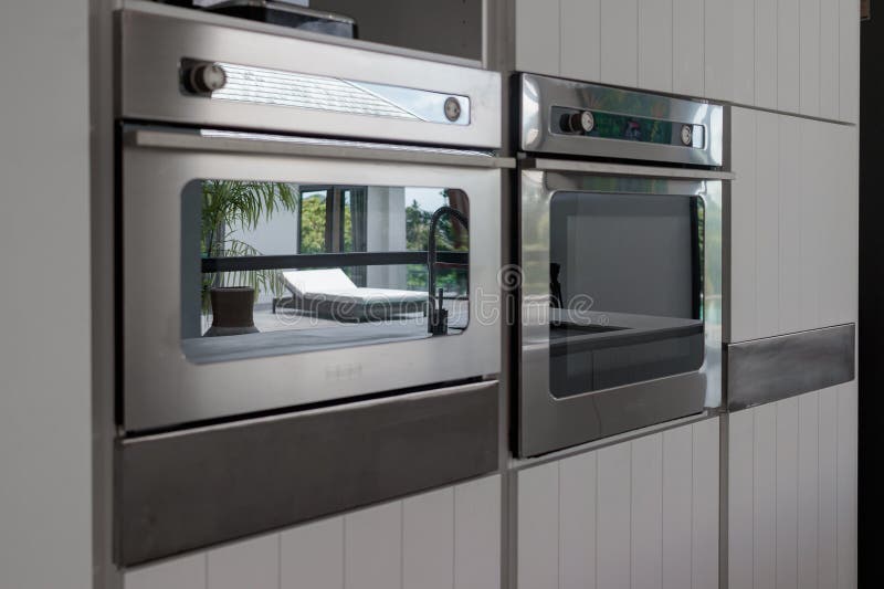 Built-in Stainless Steel Oven in Large Luxury Kitchen Stock Photo ...